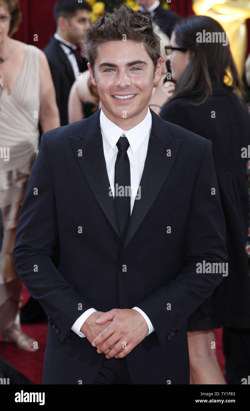 Actor Zac Efron arrives on the red carpet at the 82nd Academy Awards in ...
