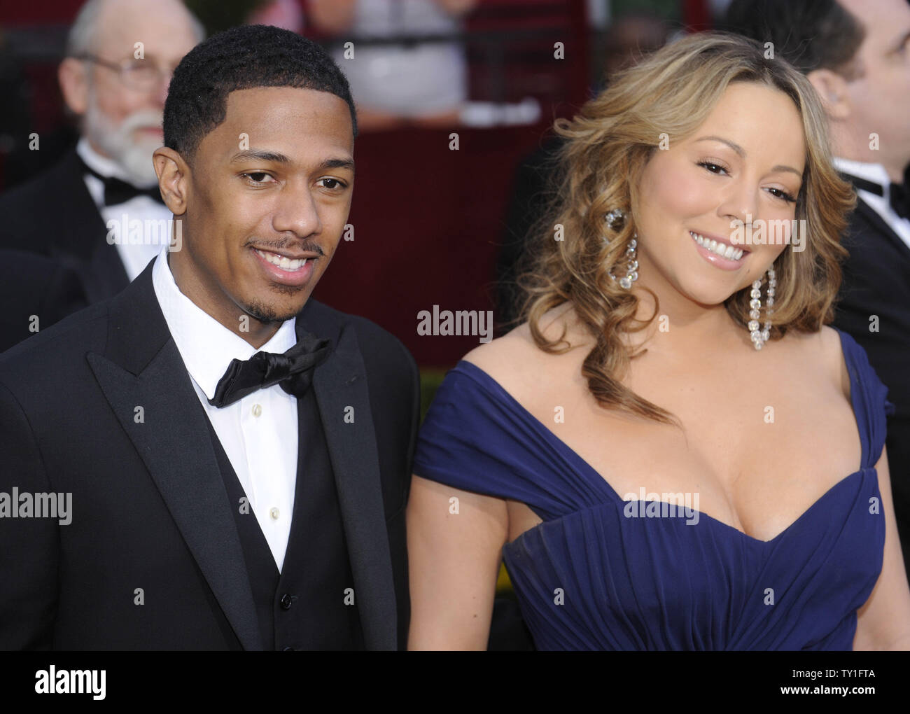 Mariah Carey and husband Nick Cannon arrive on the red carpet at the ...