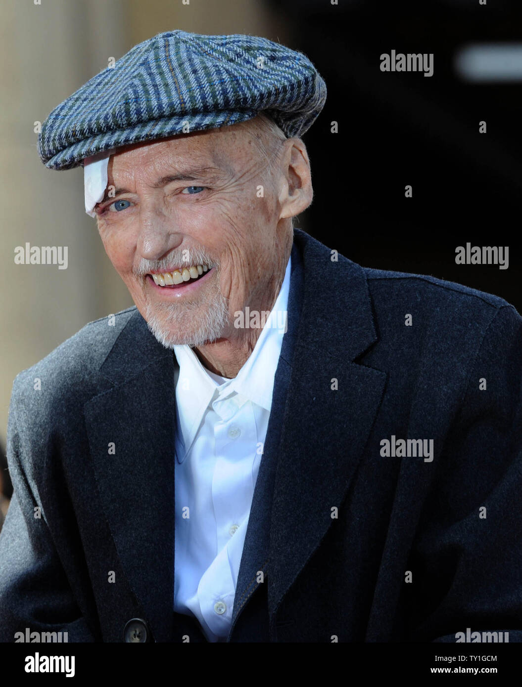 Actor Dennis Hopper listens to comments during a ceremony where Hopper ...