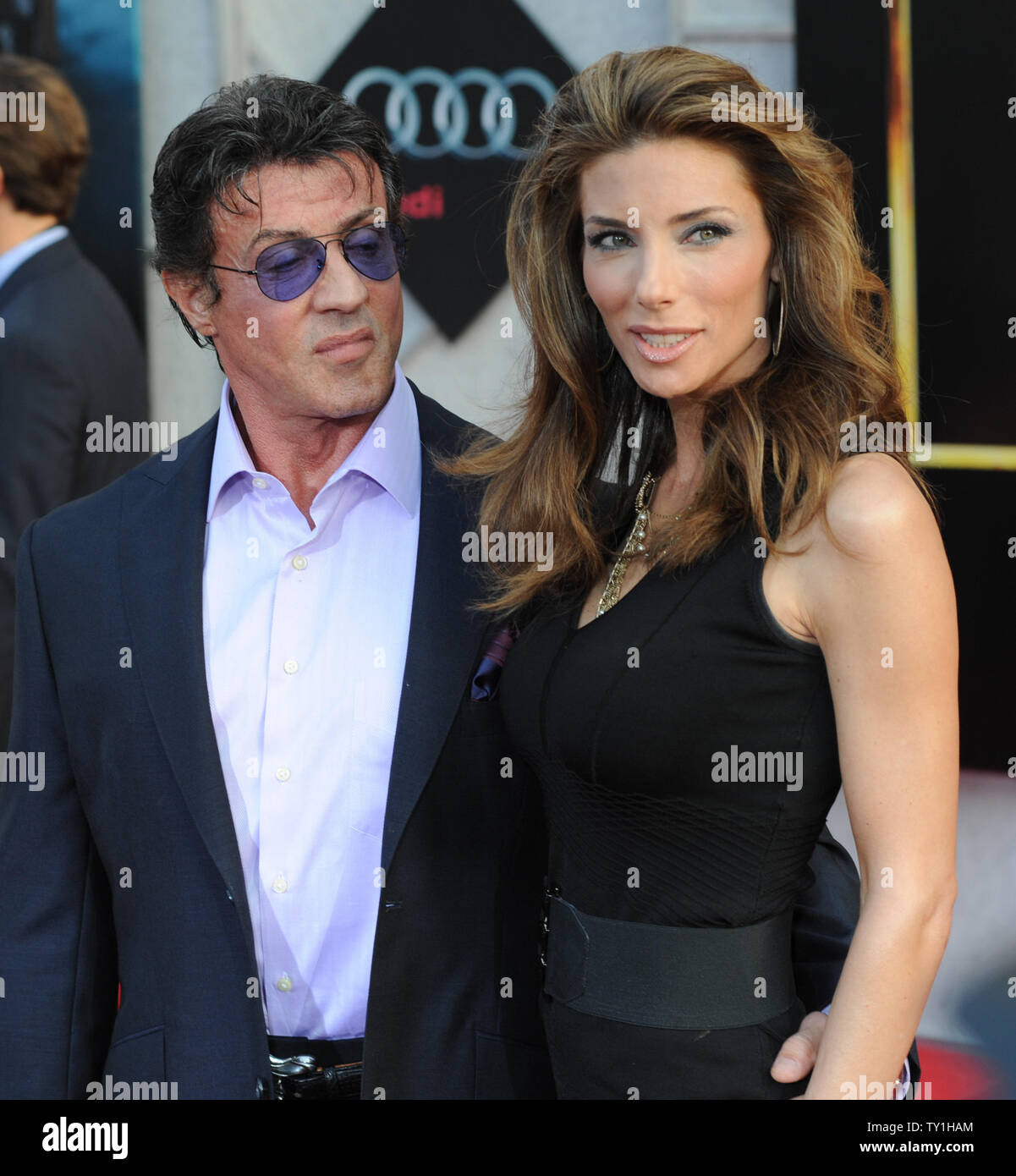 Actor Sylvester Stallone and his wife Jennifer Flavin attend the ...