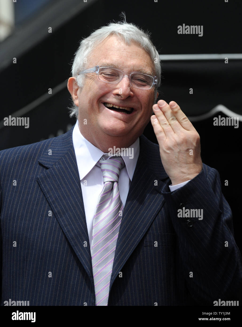 Singer, composer and songwriter Randy Newman reacts during an unveiling ...
