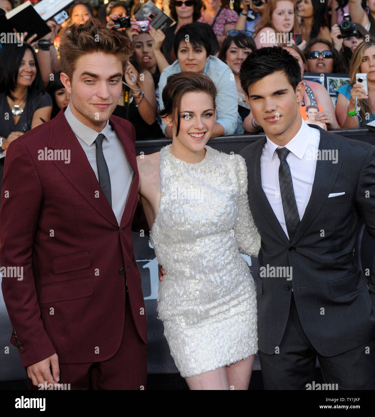 Cast members Robert Pattinson, Kristen Stewart and Taylor Lautner (L-R ...