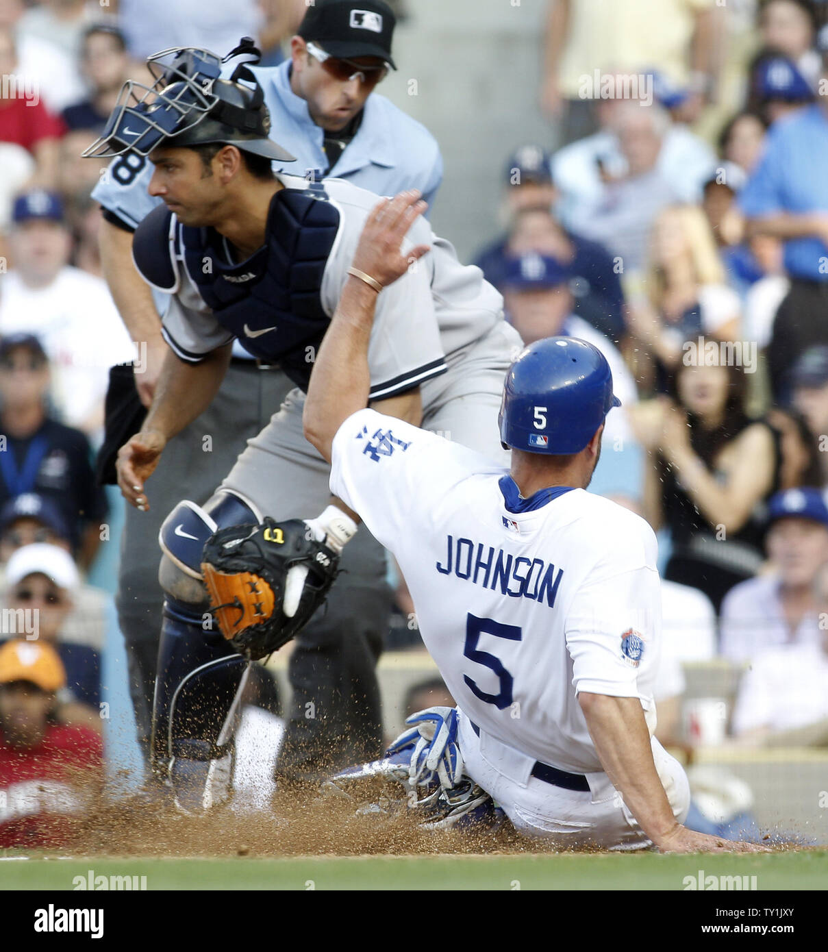 Los Angeles Dodgers Reed Johnson (5) scores a run as New York Yankees ...
