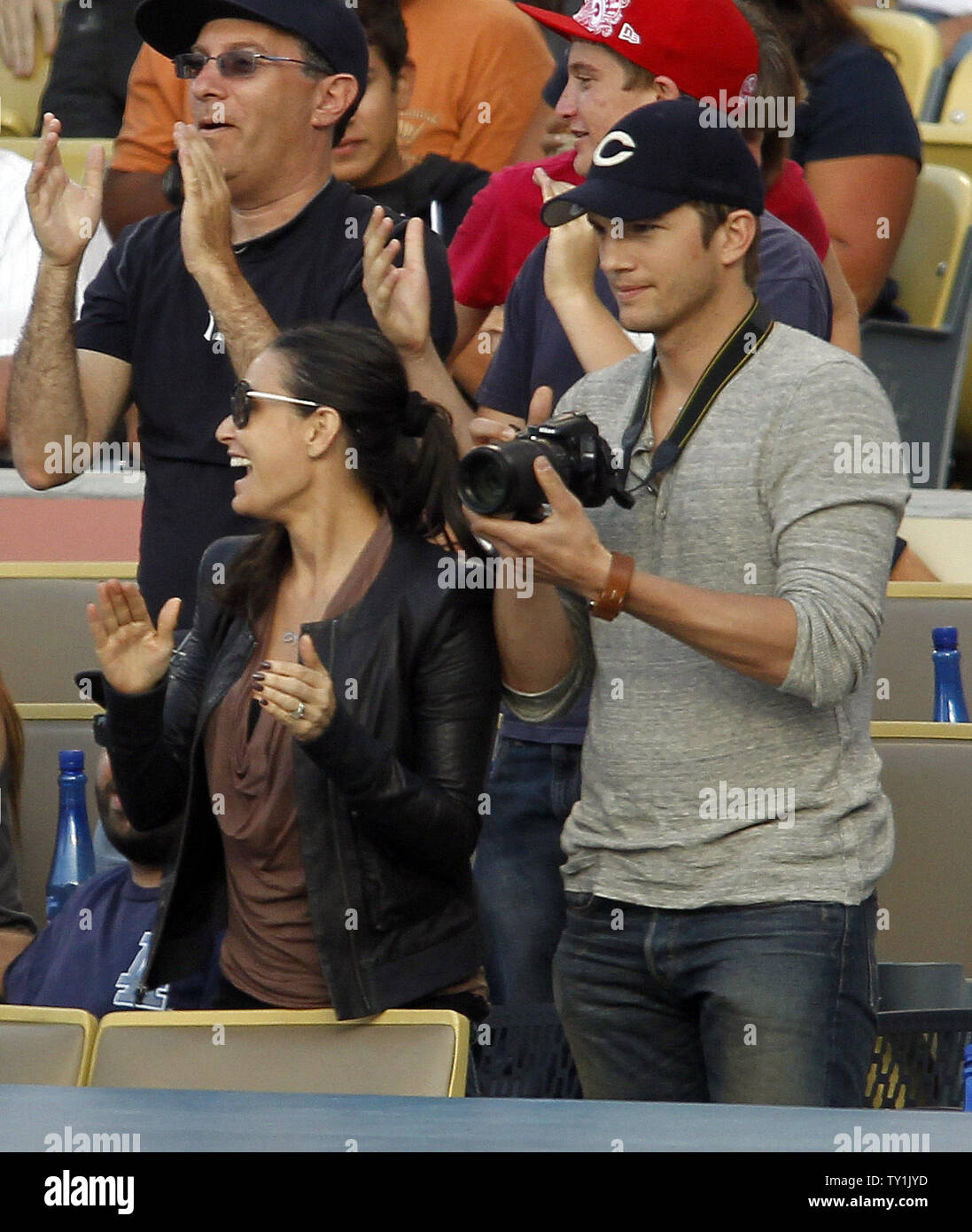 Demi Moore and Ashton Kutcher cheer on a homerun by Yankees Alex ...
