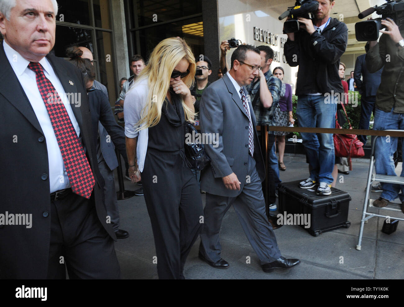 Actress Lindsay Lohan departs the Beverly Hills courthouse following ...