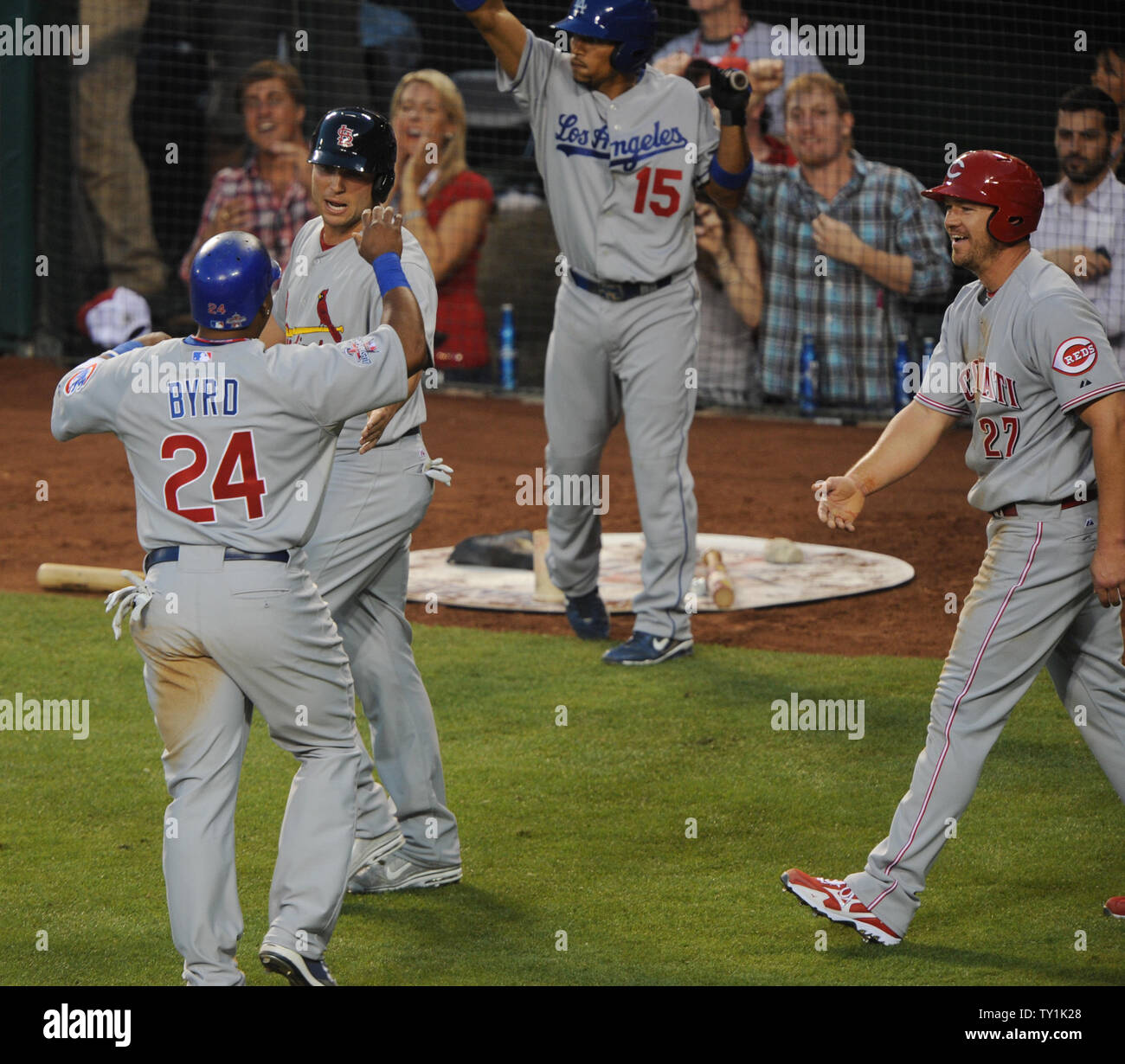 National League's Marlon Byrd, of the Chicago Cubs (24) celebrates with ...
