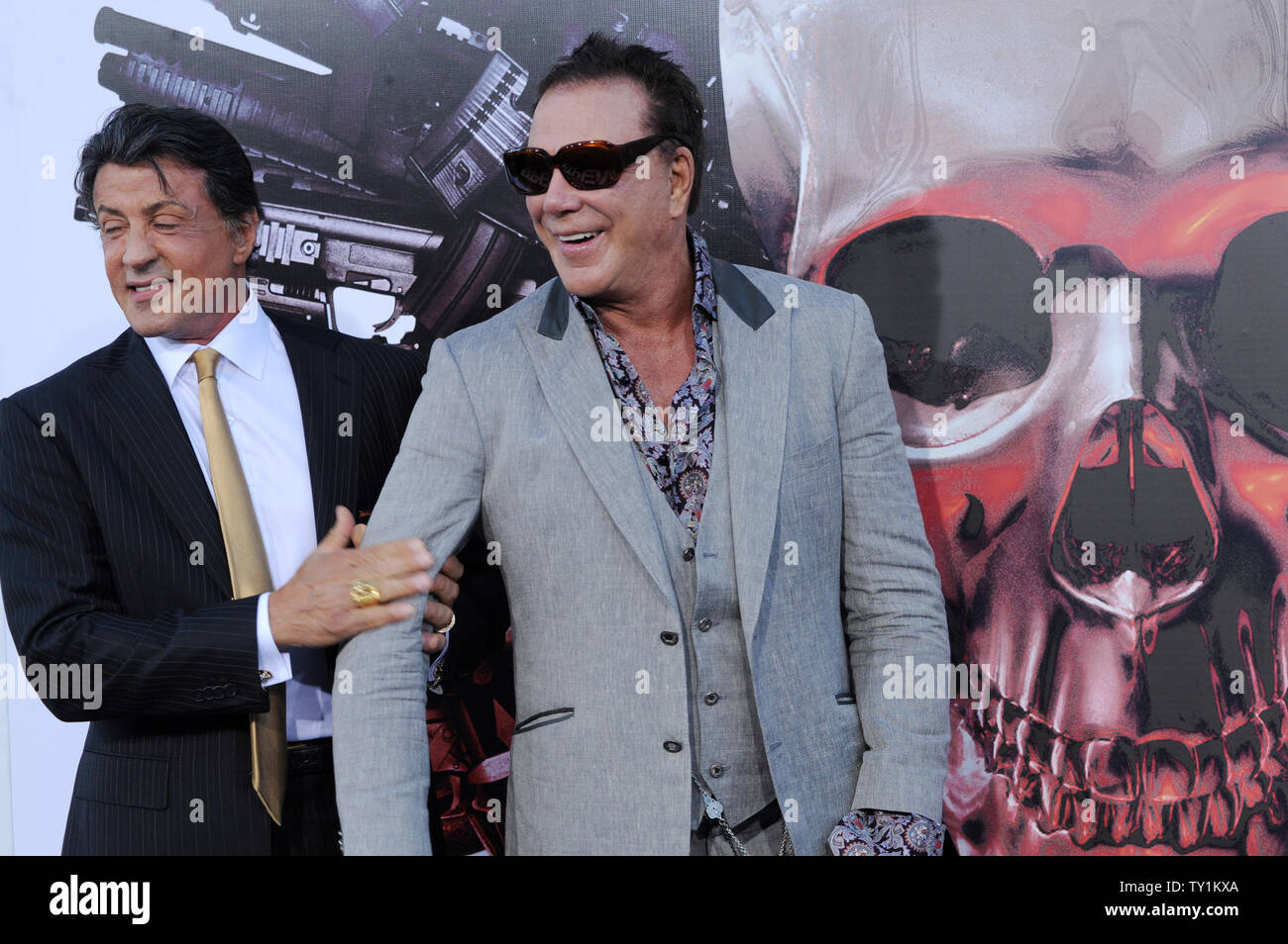 Cast members Sylvestor Stallone (L) and Mickey Rourke attend the ...