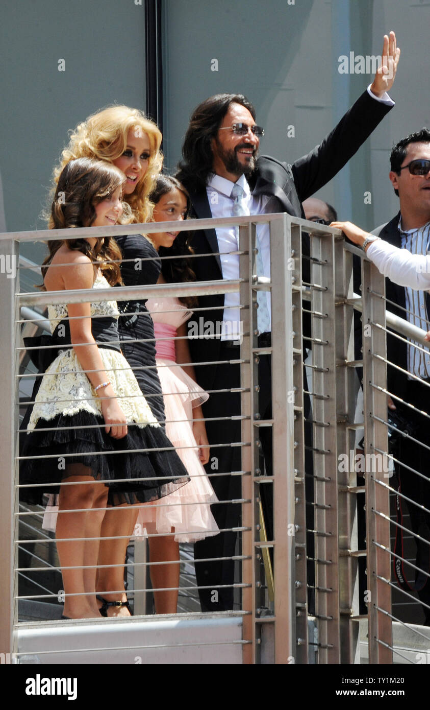 Mexican singer Marco Antonio Solis acknowledges fans as he departs with ...