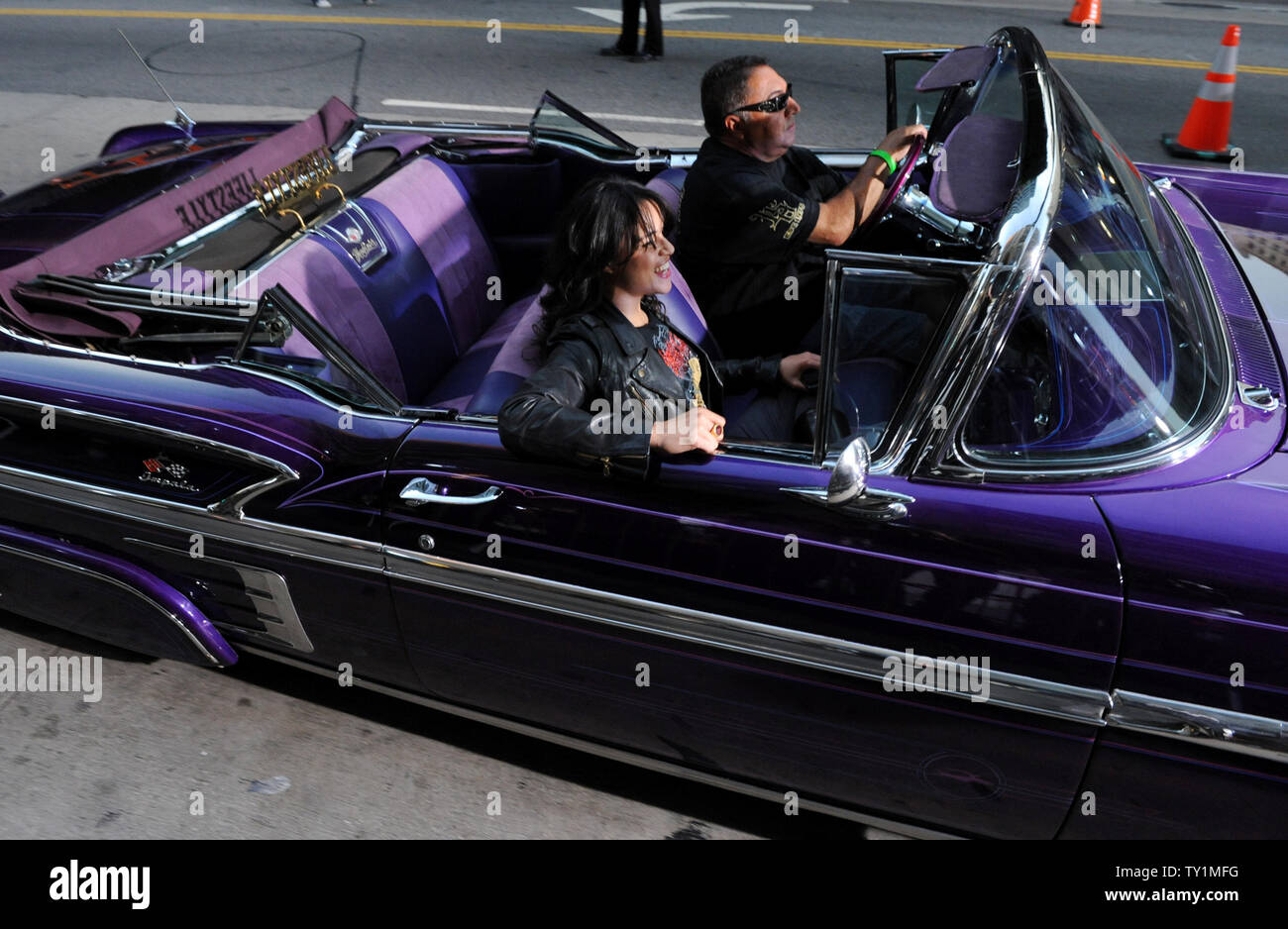 Cast member Michelle Rodriguez arrives in a lowrider car at the ...