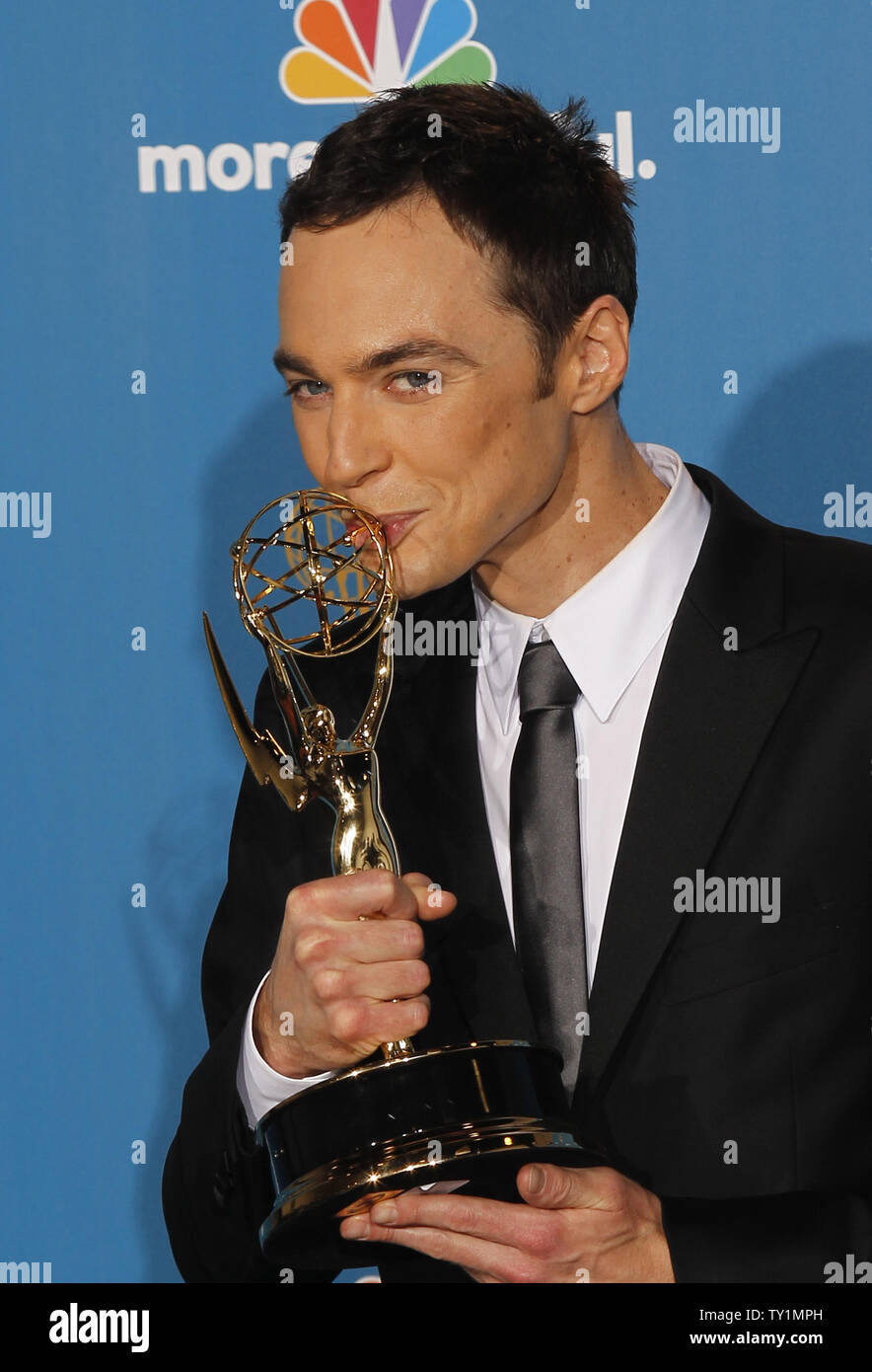 Jim Parsons holds his Emmy Award for Outstanding Lead Actor in a Comedy ...