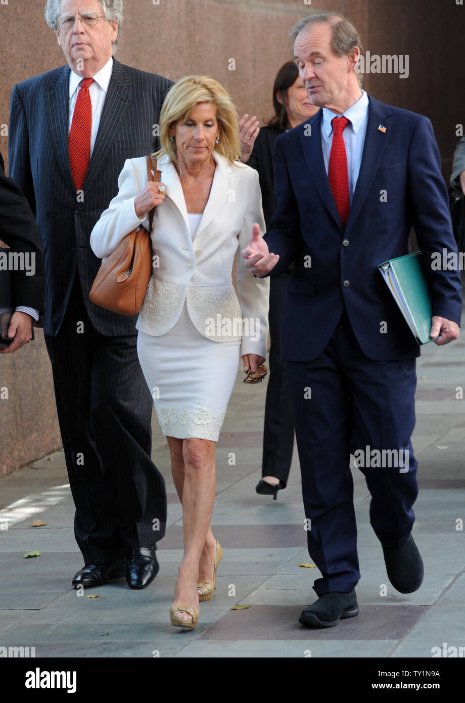 Jamie McCourt (C) departs Superior Court in Los Angeles on September 1 ...