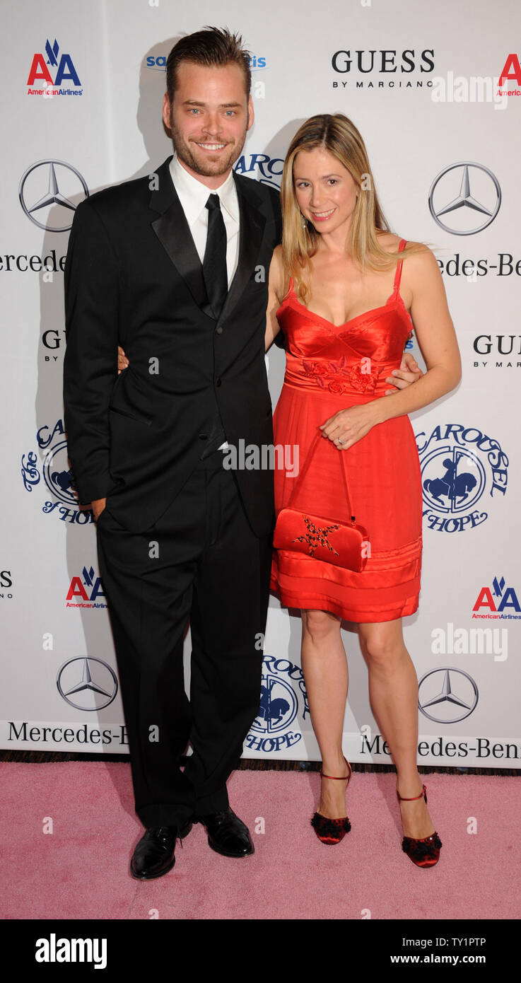 Actress Mira Sorvino and her husband, actor Christopher Backus arrive ...