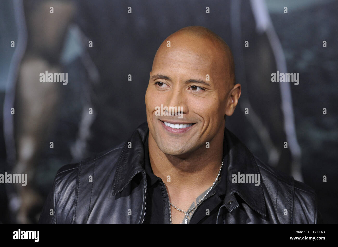 Cast member Dwayne Johnson attends the premiere of the film "Faster" at ...