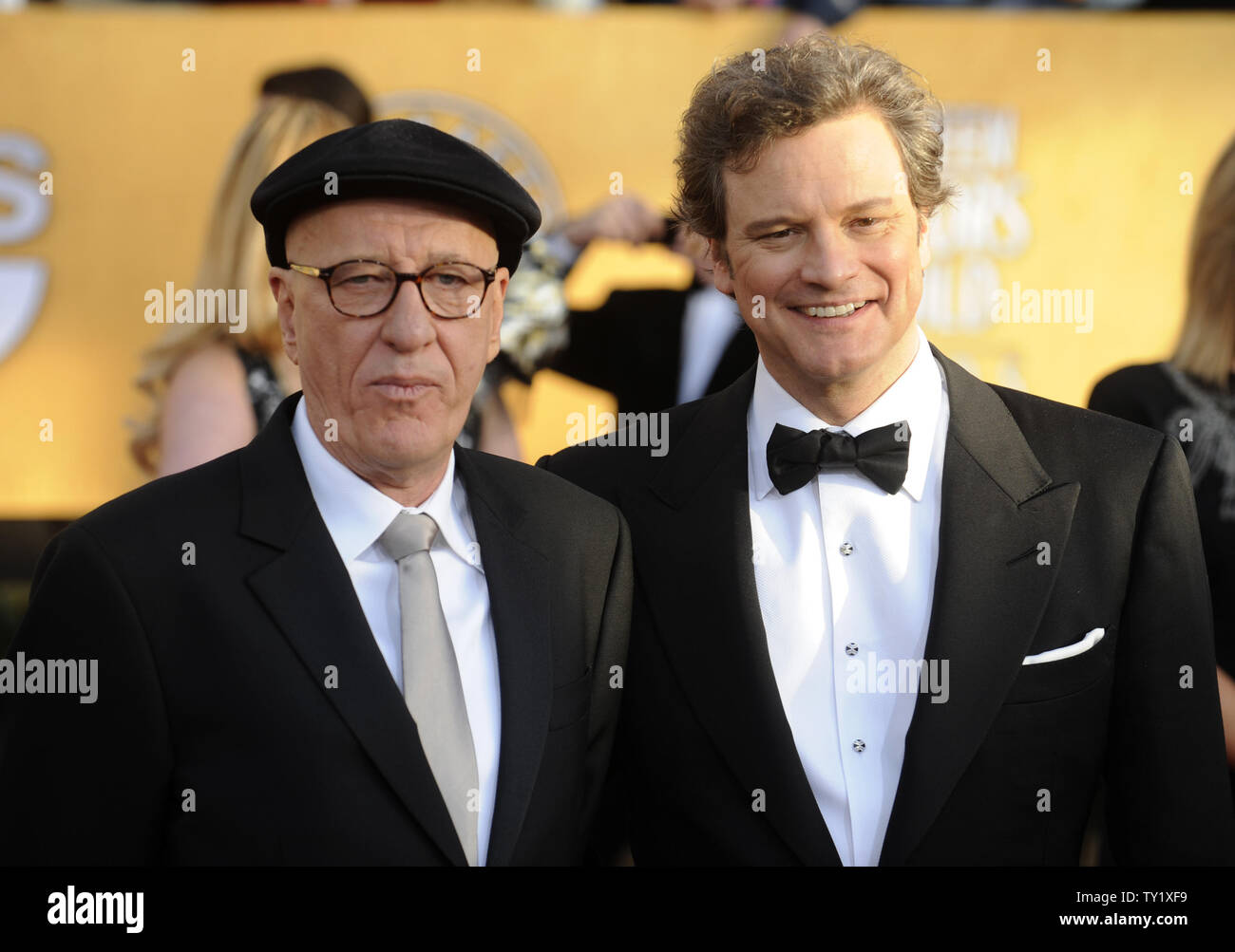 Colin Firth (R) and Geoffrey Rush (L) arrive at the 17th annual Screen ...