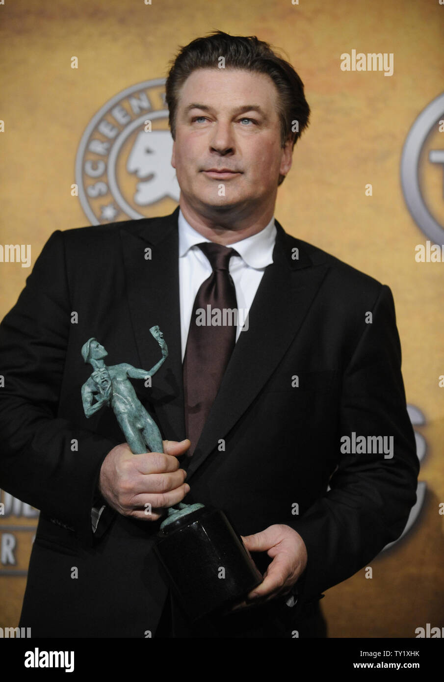 Alec Baldwin poses backstage after winning the male actor in a comedy ...
