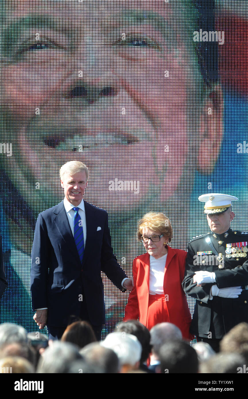 Former first lady Nancy Reagan is helped on stage by Marine Lt. Gen ...