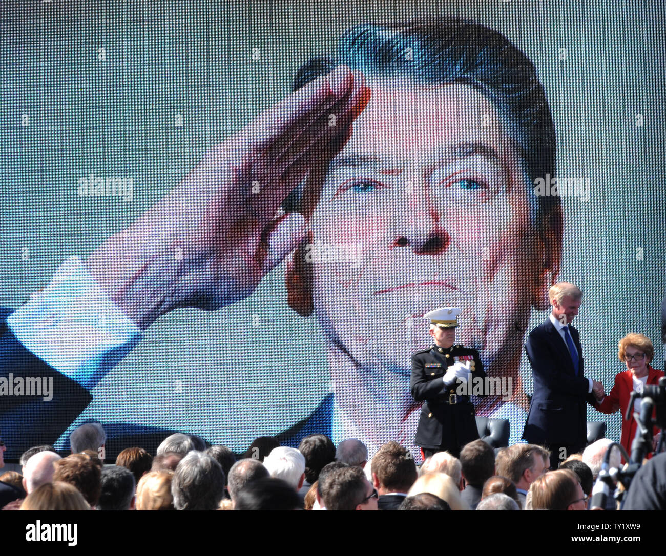 Former first lady Nancy Reagan is helped on stage by Marine Lt. Gen ...
