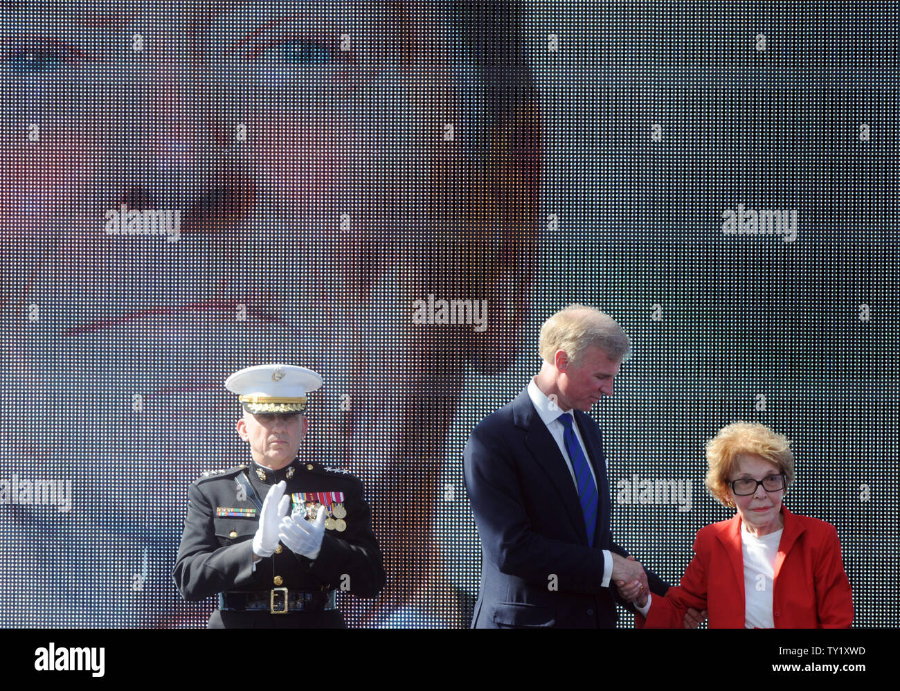 Former first lady Nancy Reagan is helped on stage by Marine Lt. Gen ...