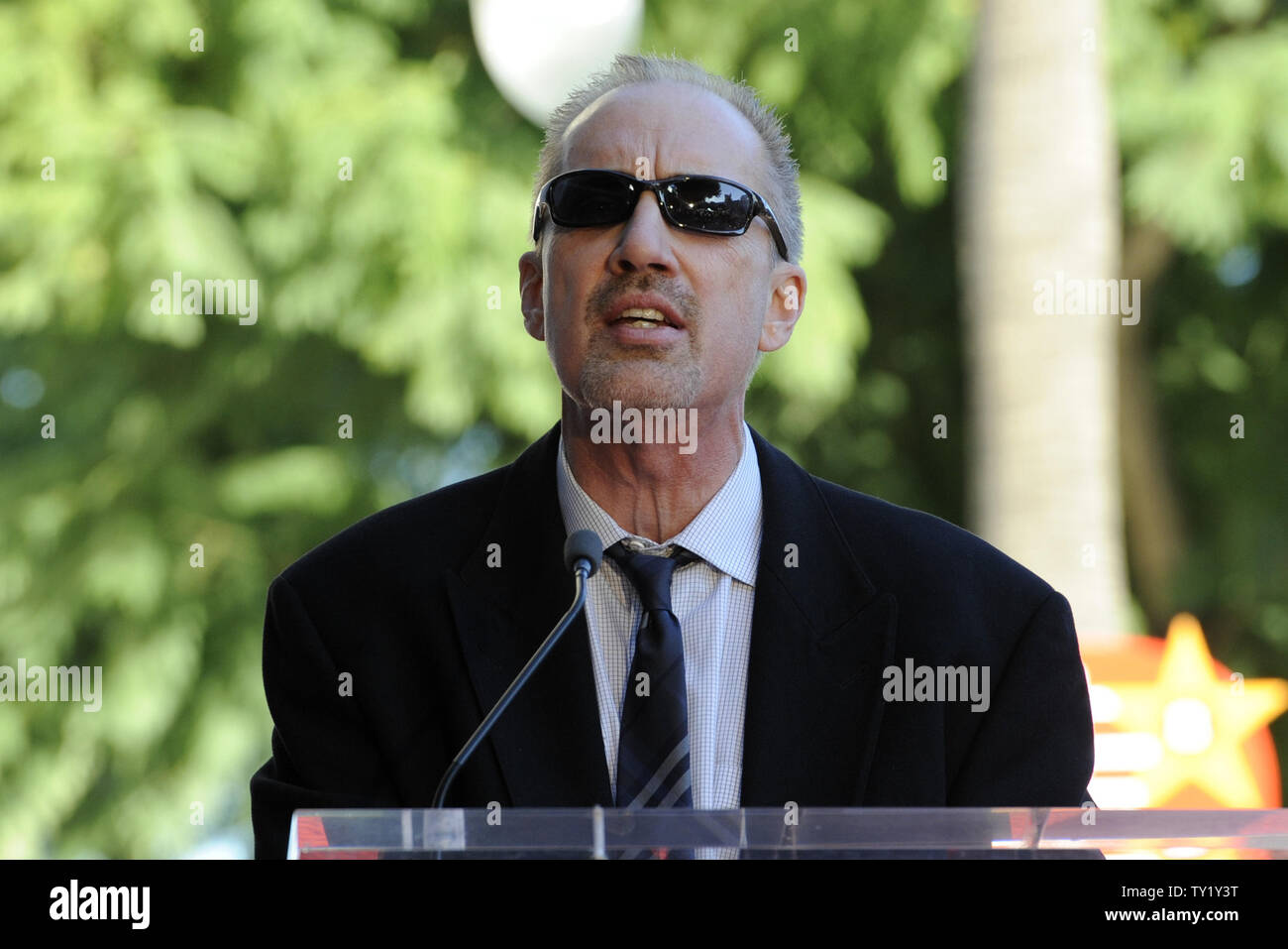 Radio personality Gary Bryan speaks at a ceremony where John Langley ...