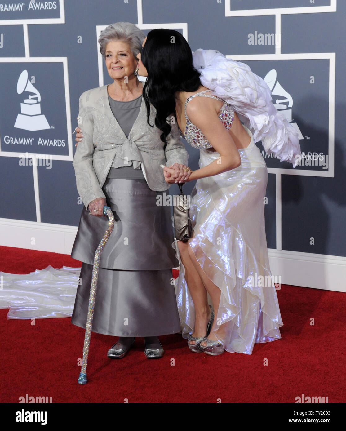 Singer Katy Perry (R) nuzzles her nose up against her grandmother Mary ...