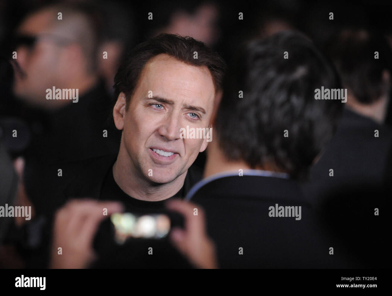 Cast member Nicolas Cage attends the premiere of the film "Drive Angry ...