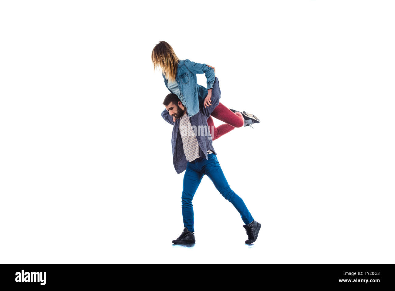 Amazing dancers is doing modern dance on a white background Stock Photo ...