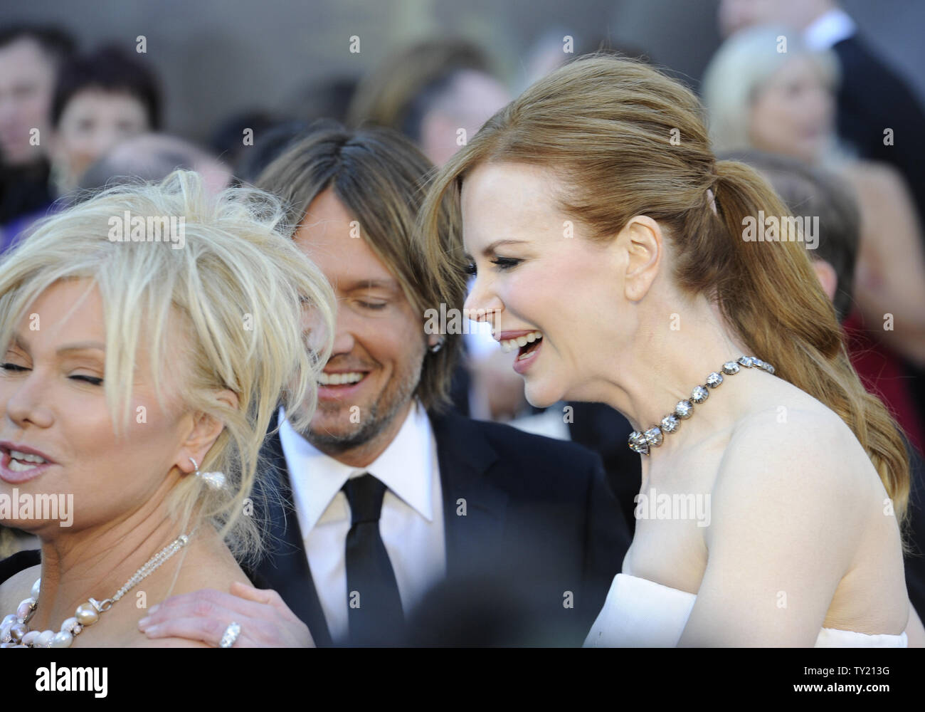 Keith Urban and Nicole Kidman arrive on the red carpet for the 83rd ...