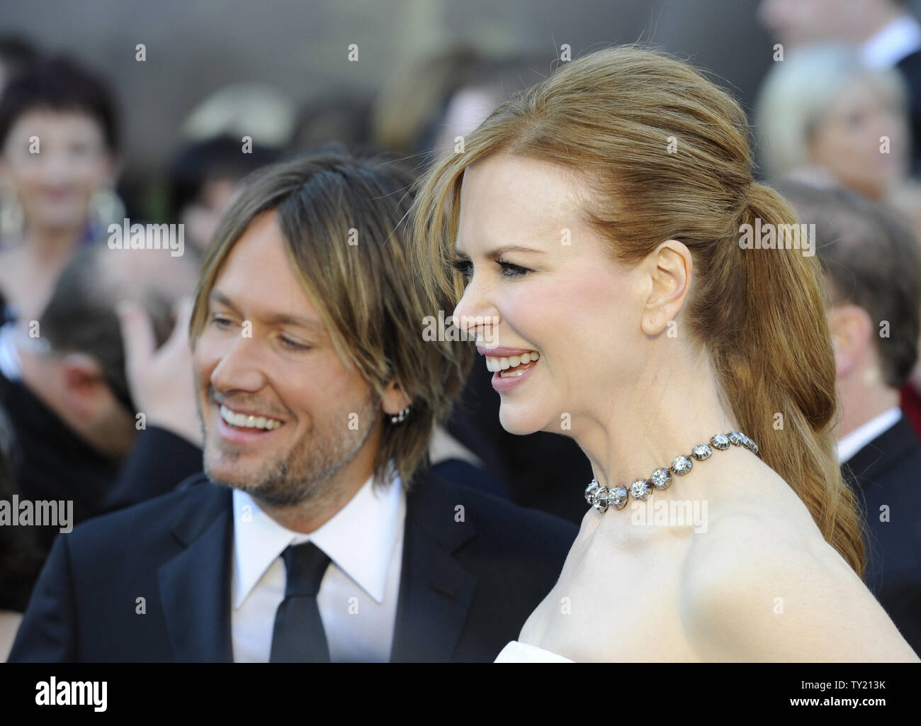 Keith Urban and Nicole Kidman arrive on the red carpet for the 83rd ...
