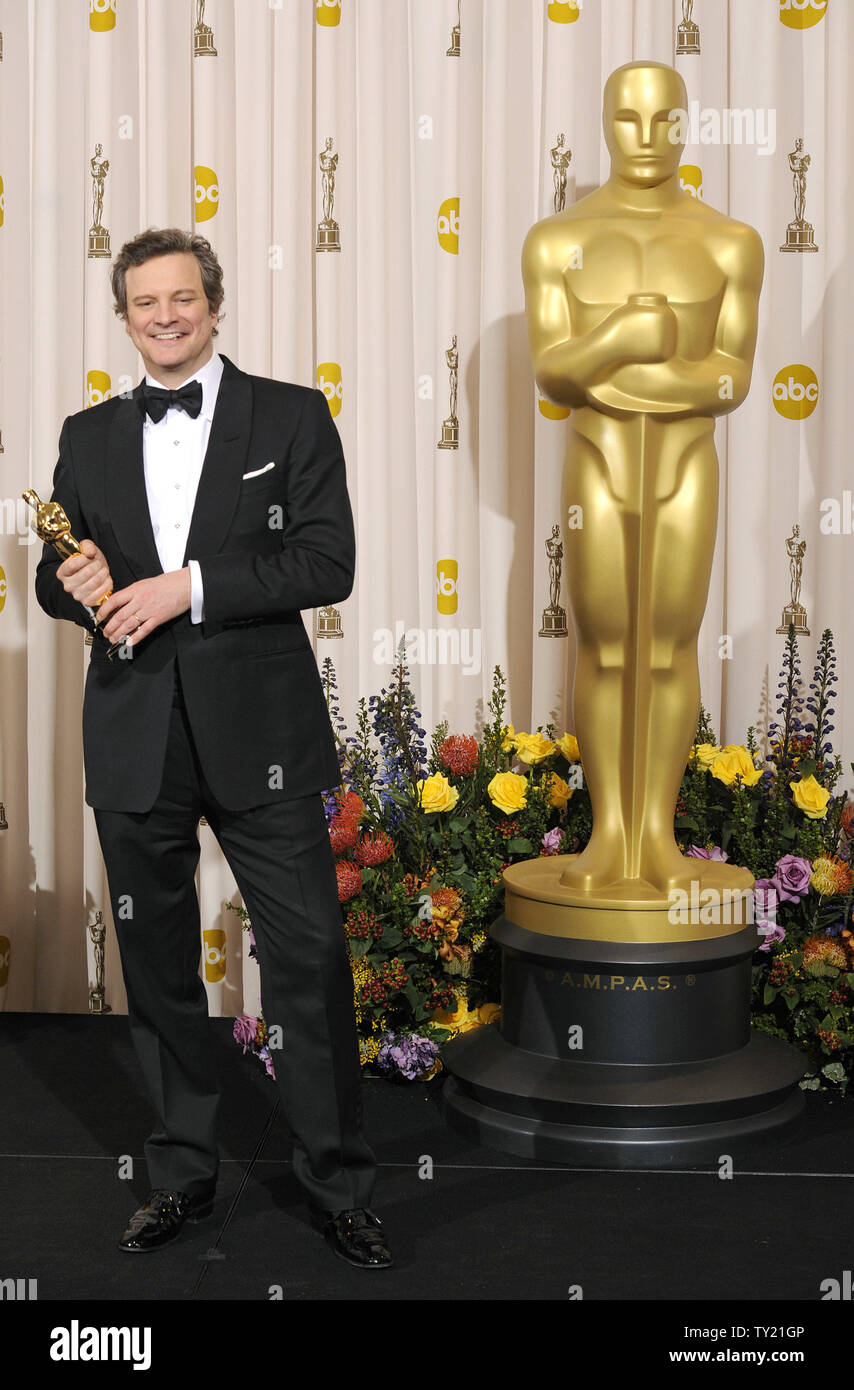 Best Actor Colin Firth poses with his Oscar backstage at the 83rd ...