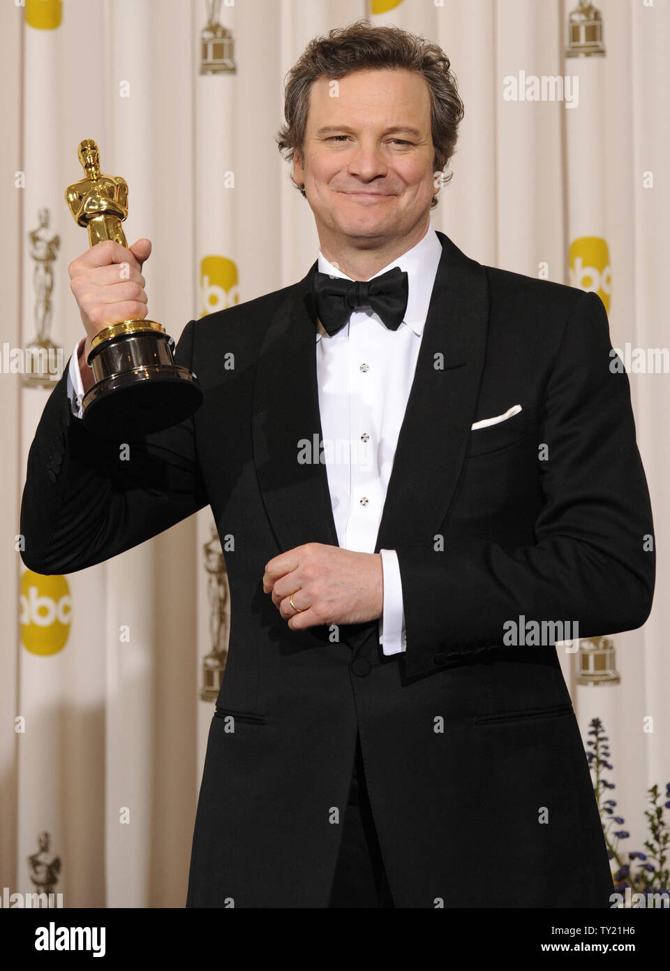 Best Actor Colin Firth poses with his Oscar backstage at the 83rd ...