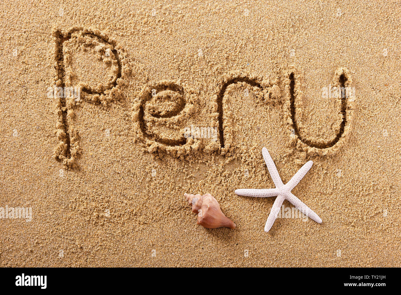 Peru beach word written in sand travel sign concept Stock Photo - Alamy