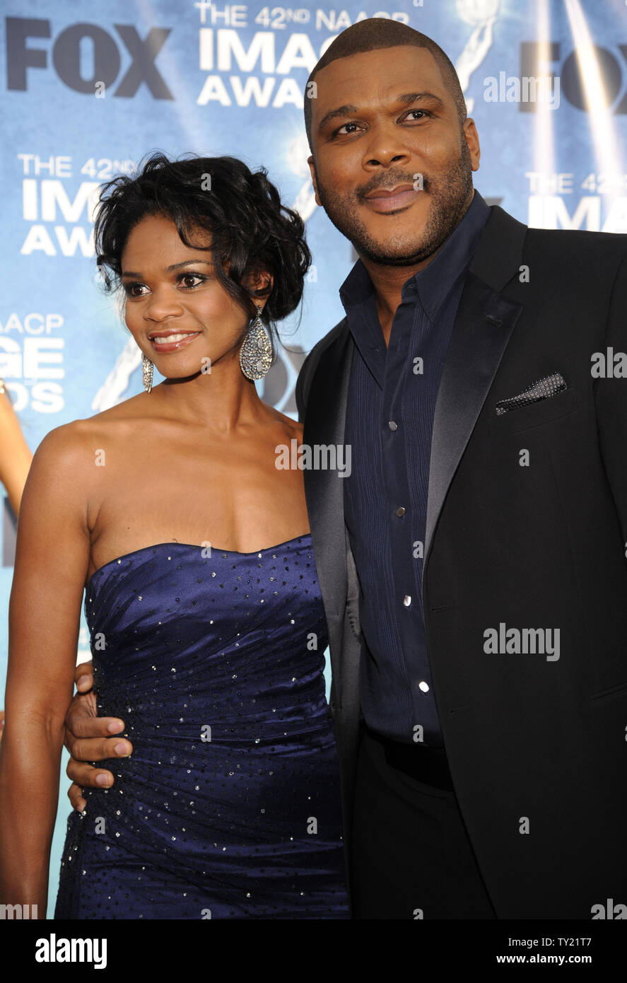 Tyler Perry (R) and Kimberly Elise attend the 42nd NAACP Image Awards ...