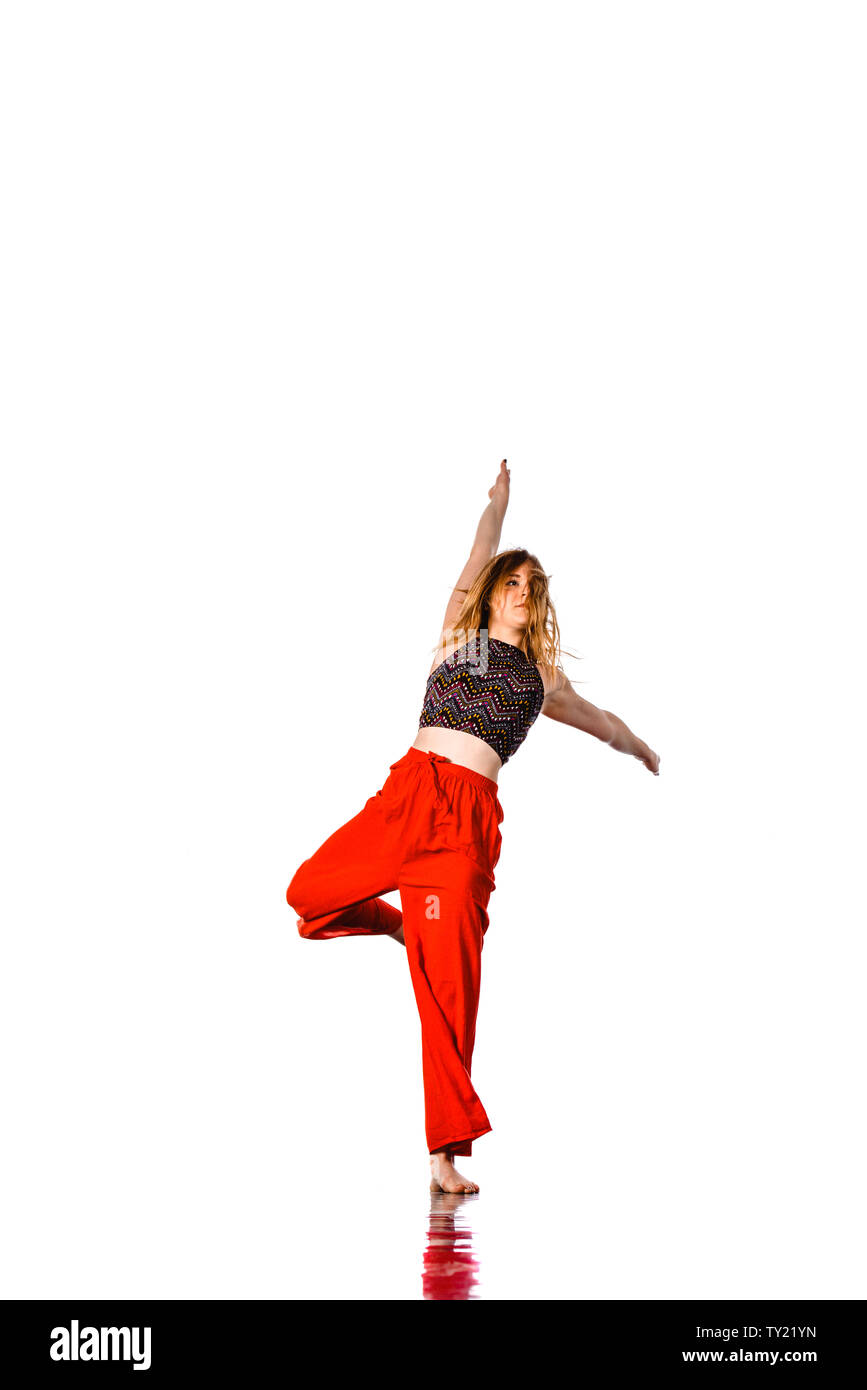 Excited dance fitness woman dancer training with fun over studio ...