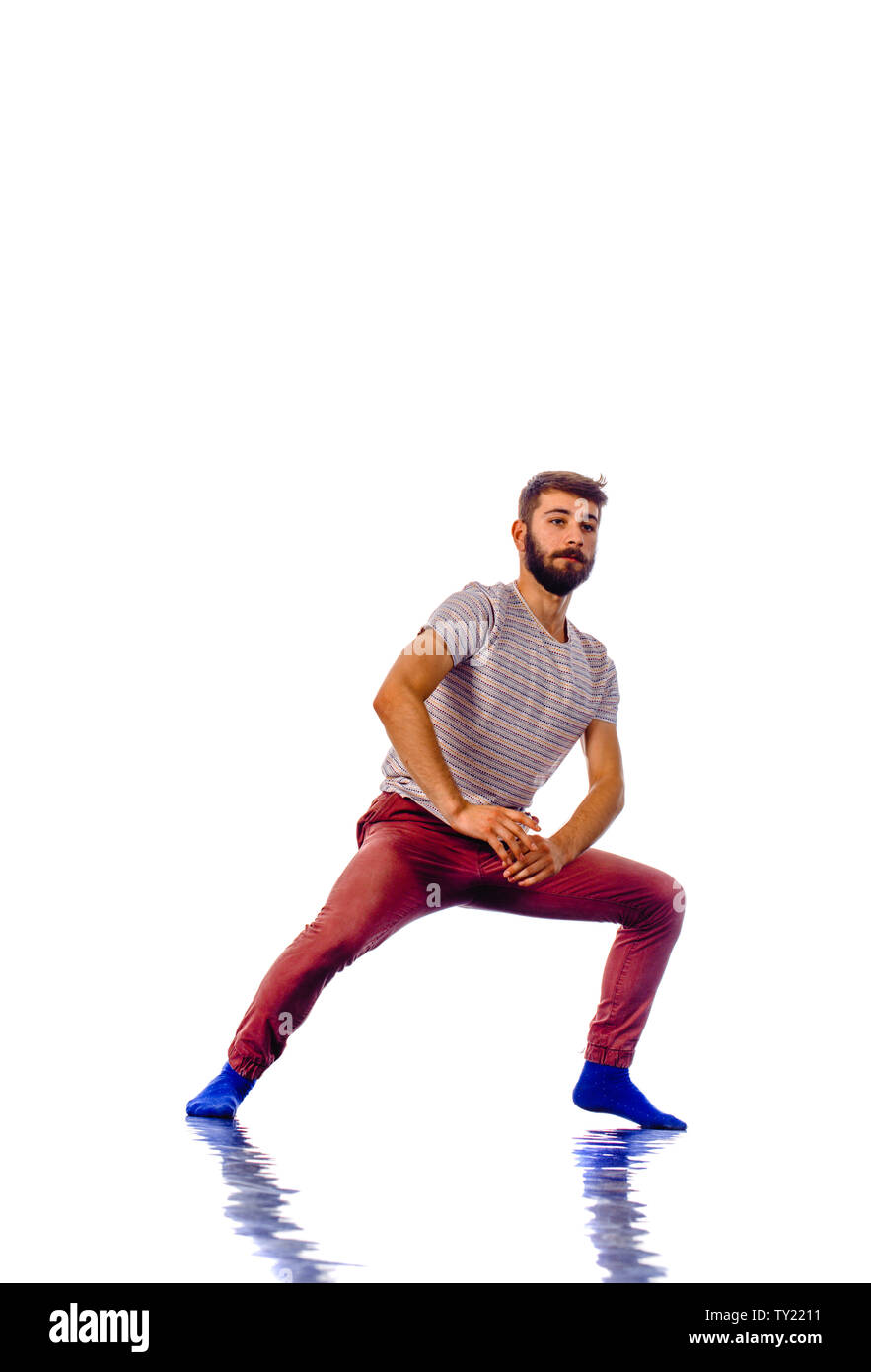 Man is doing modern dance on a white background Stock Photo - Alamy
