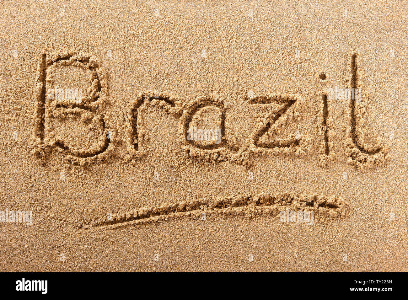 Brazil beach word sign written in sand Stock Photo - Alamy