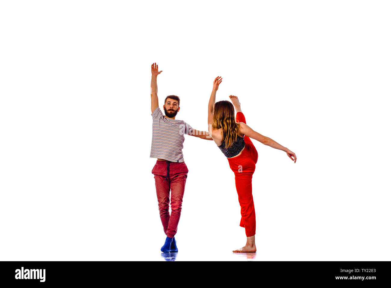 Attractive couple dancing social dance. Couple of young man and woman ...