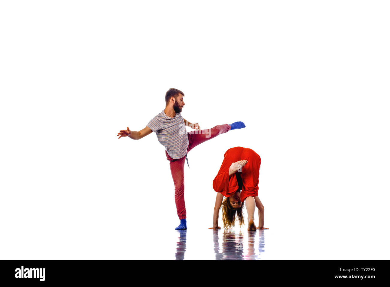 The two young modern ballet dancing over white studio background Stock ...