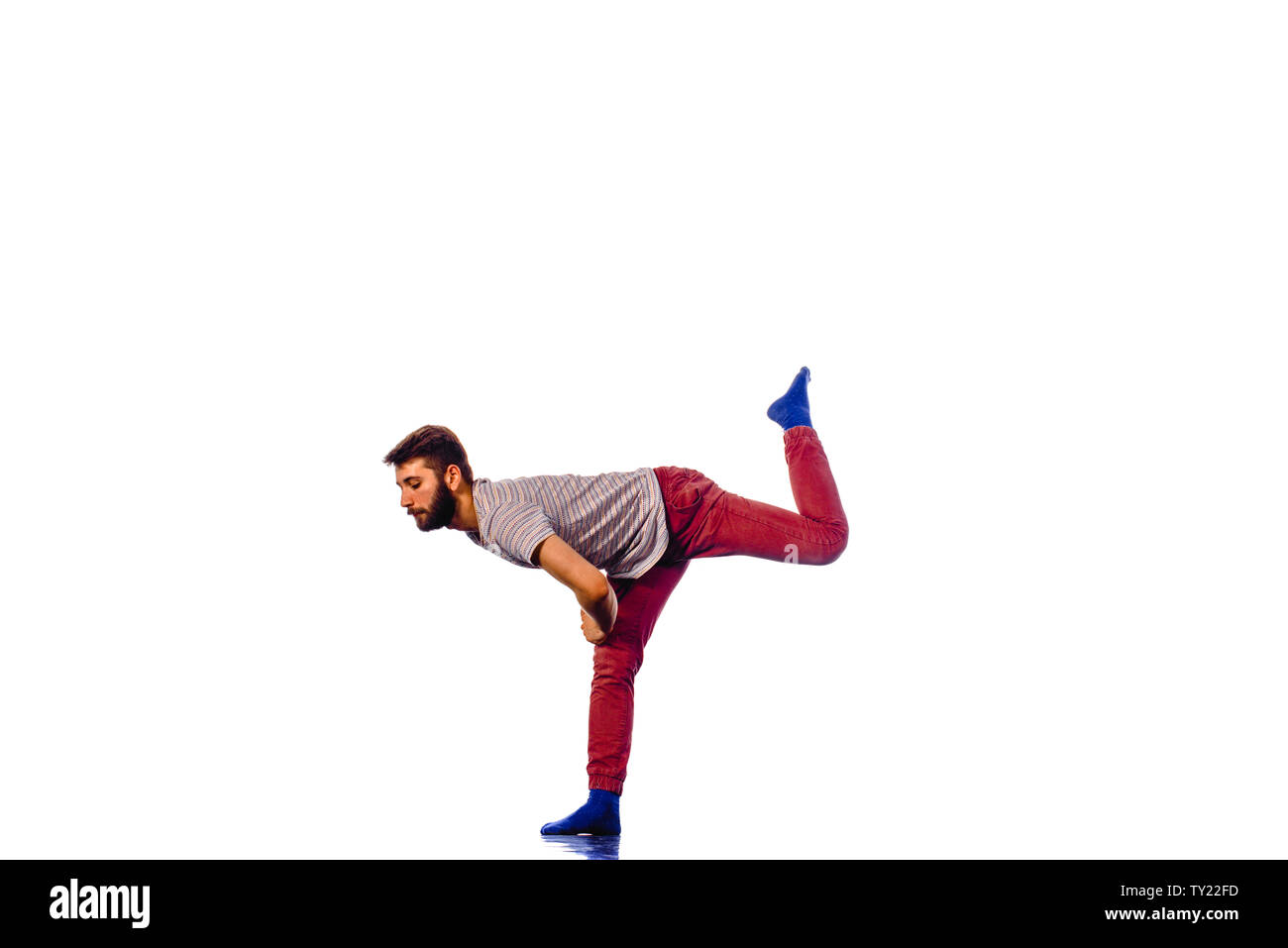 Portrait of a young man dancing of joy. Isolated image on white ...