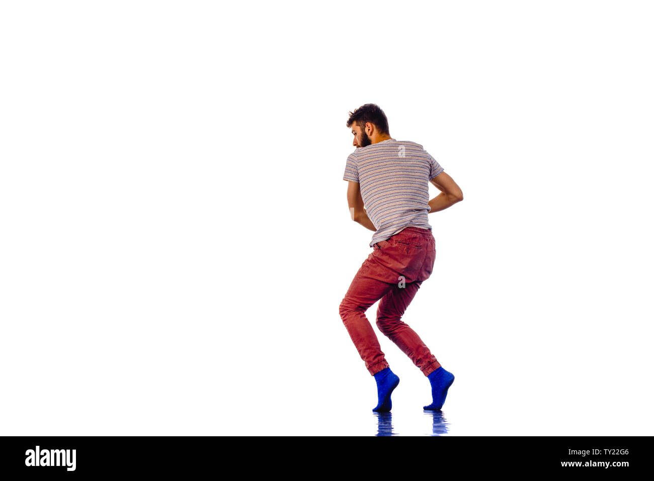 Man is doing modern dance on a white background Stock Photo - Alamy