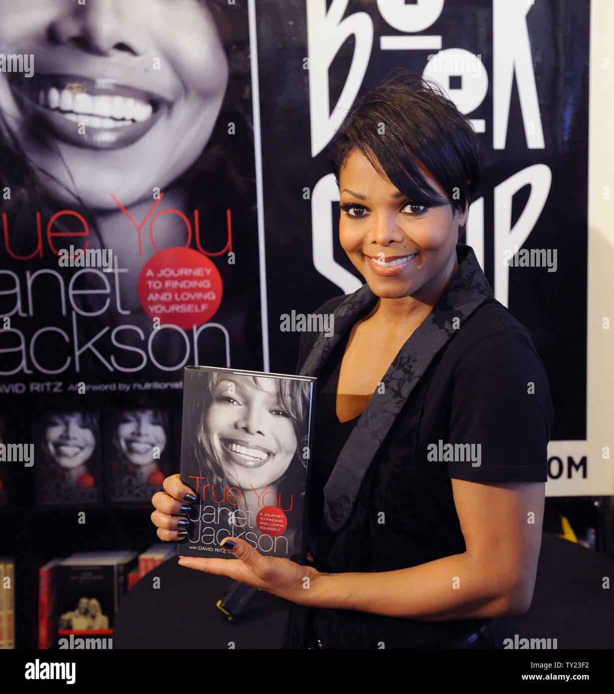 Singer Janet Jackson attends a book signing to promote her new book ...