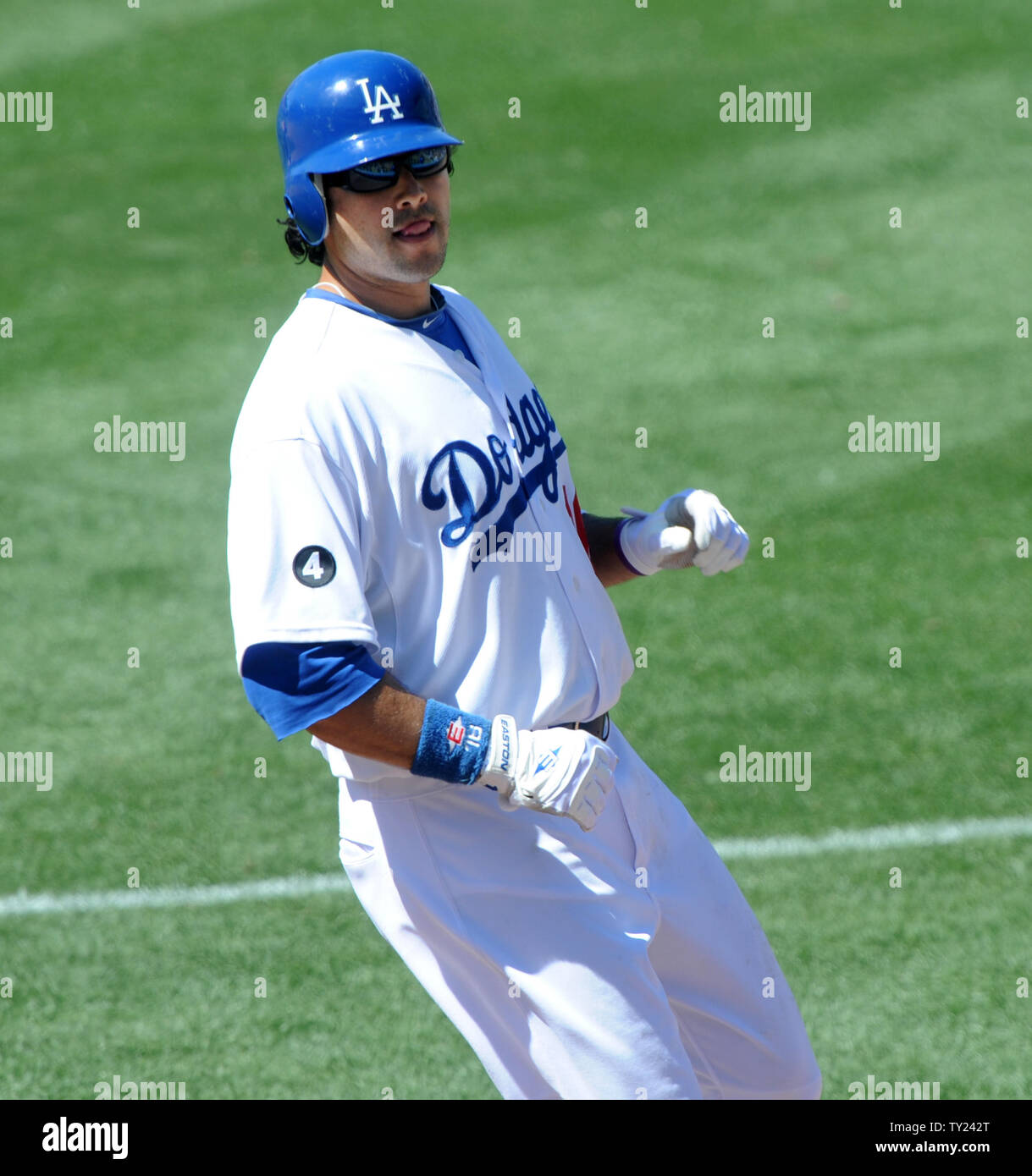 Los Angeles Dodgers' Andre Ethier crosses first after hitting a single ...