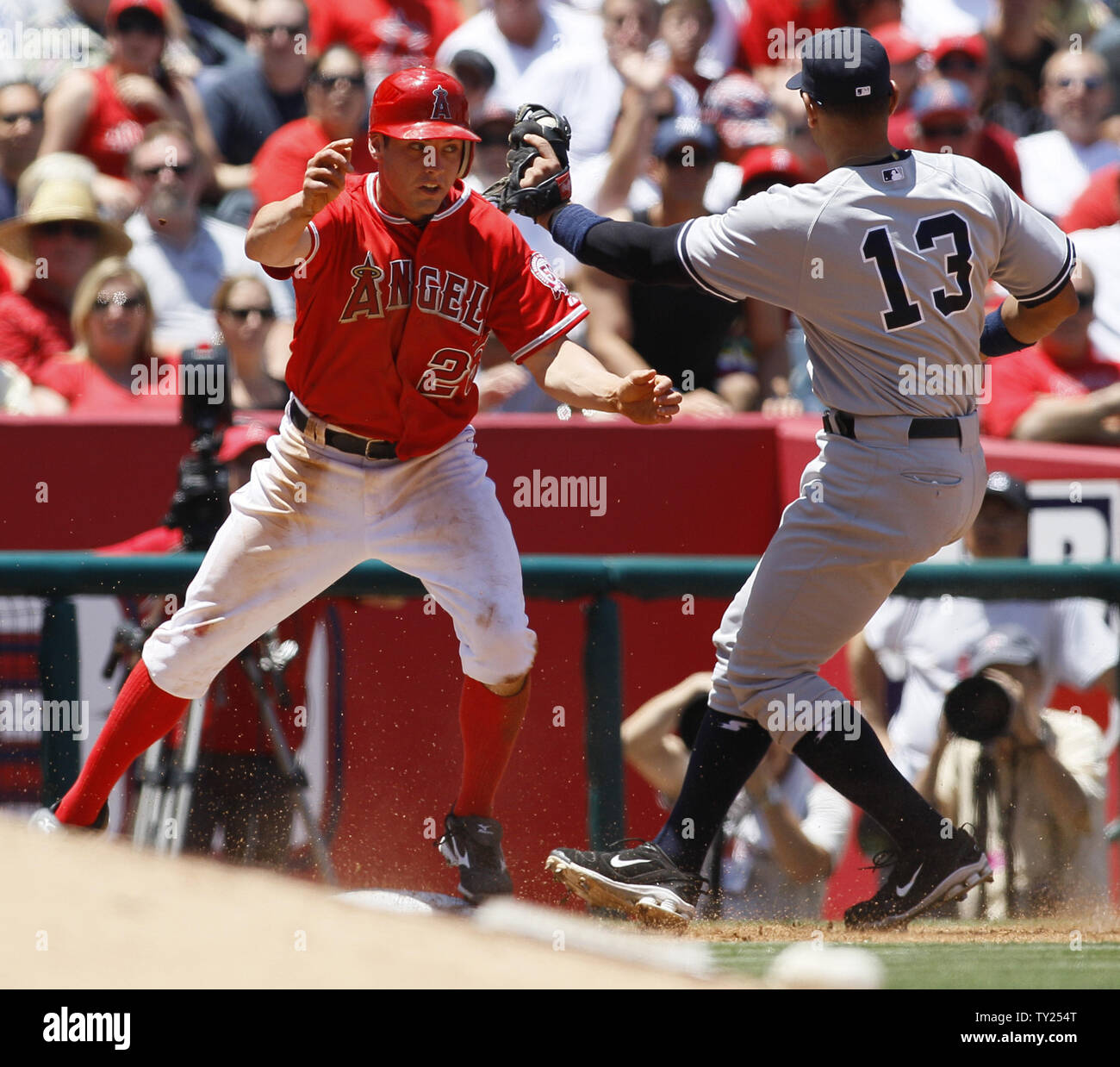 Los Angeles Angels' Peter Bourjos (25) is safe stealing third base as ...