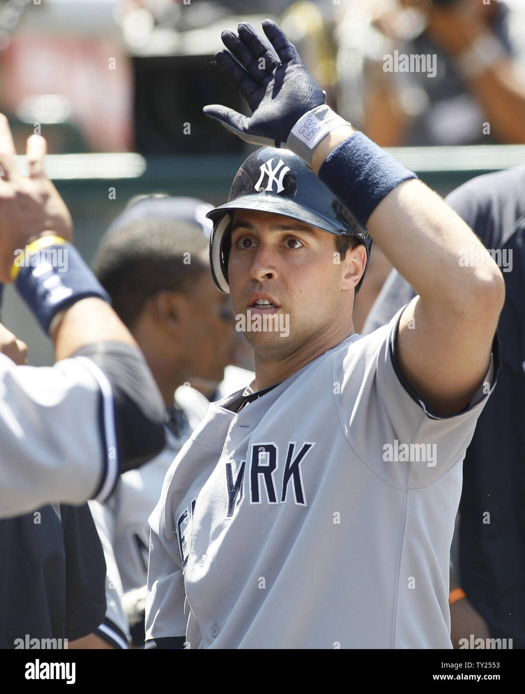 New York Yankees' Mark Teixeira hits a home run against the Los Angeles ...