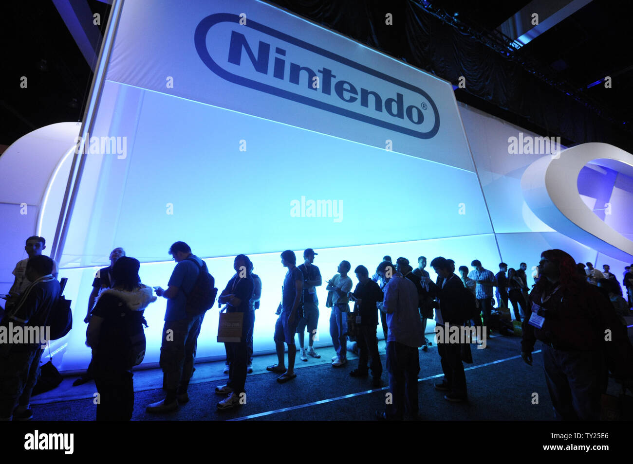 Attendees wait in line at the Nintendo booth during E3, the Electronic ...