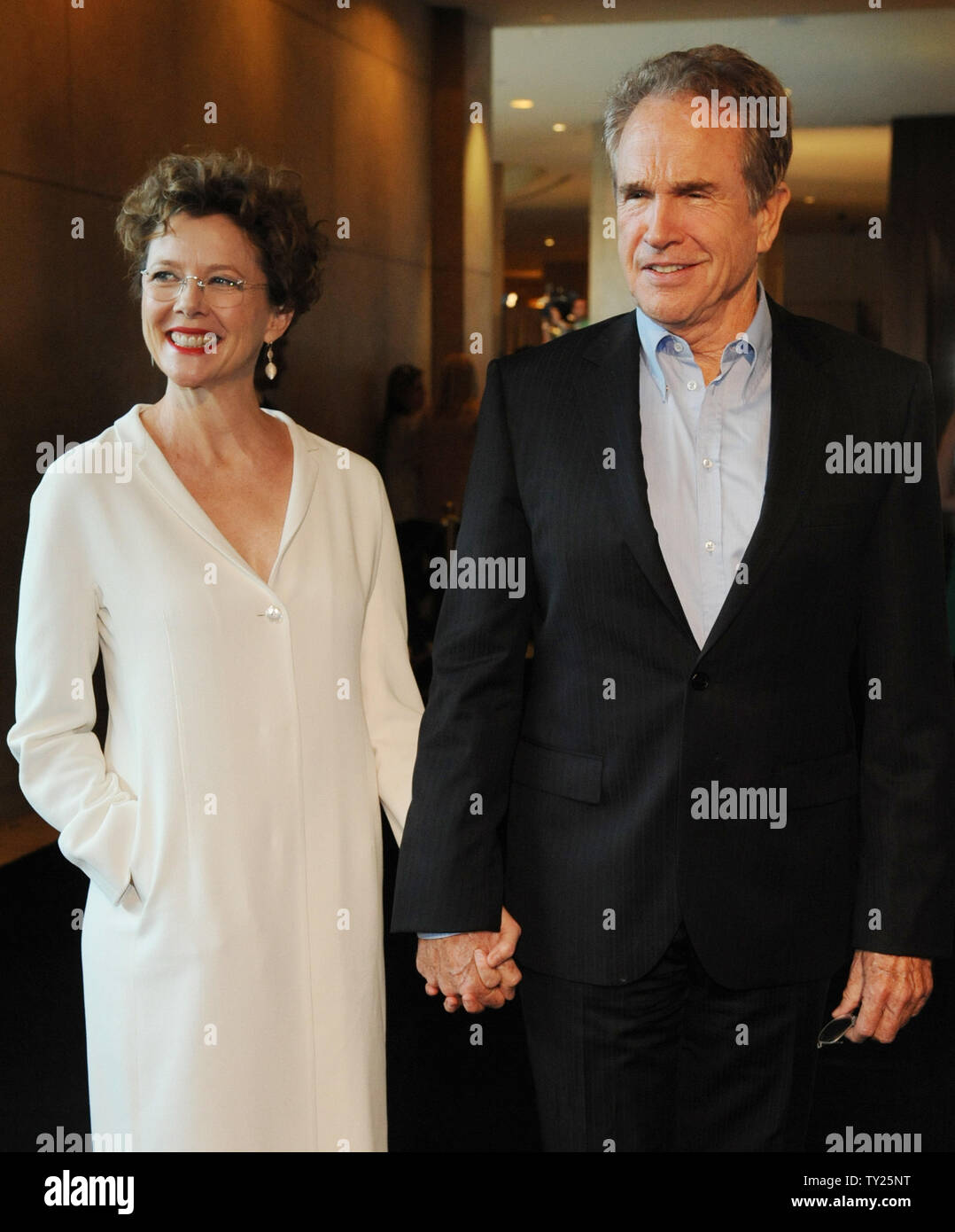 Actors Annette Bening and Warren Beatty arrive at the Women In Film Los ...