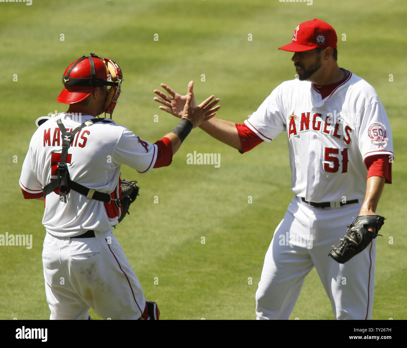 Los Angeles Angels catcher Jeff Mathis (5) and relief pitcher Jordan ...