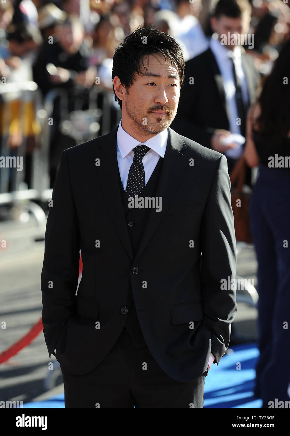 Kenneth Choi attends the premiere of the film "Captain America: The ...