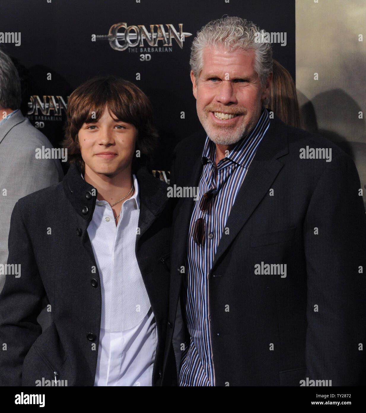 Leo Howard (L) and Ron Perlman, cast members in the motion picture ...