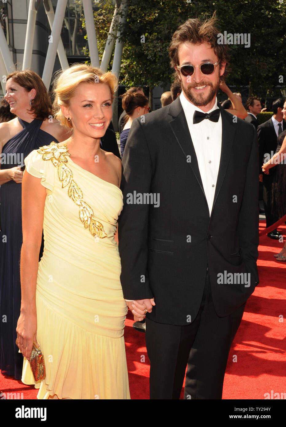 Actor Noah Wylie and his wife, actress Sara Wells arrive for the ...