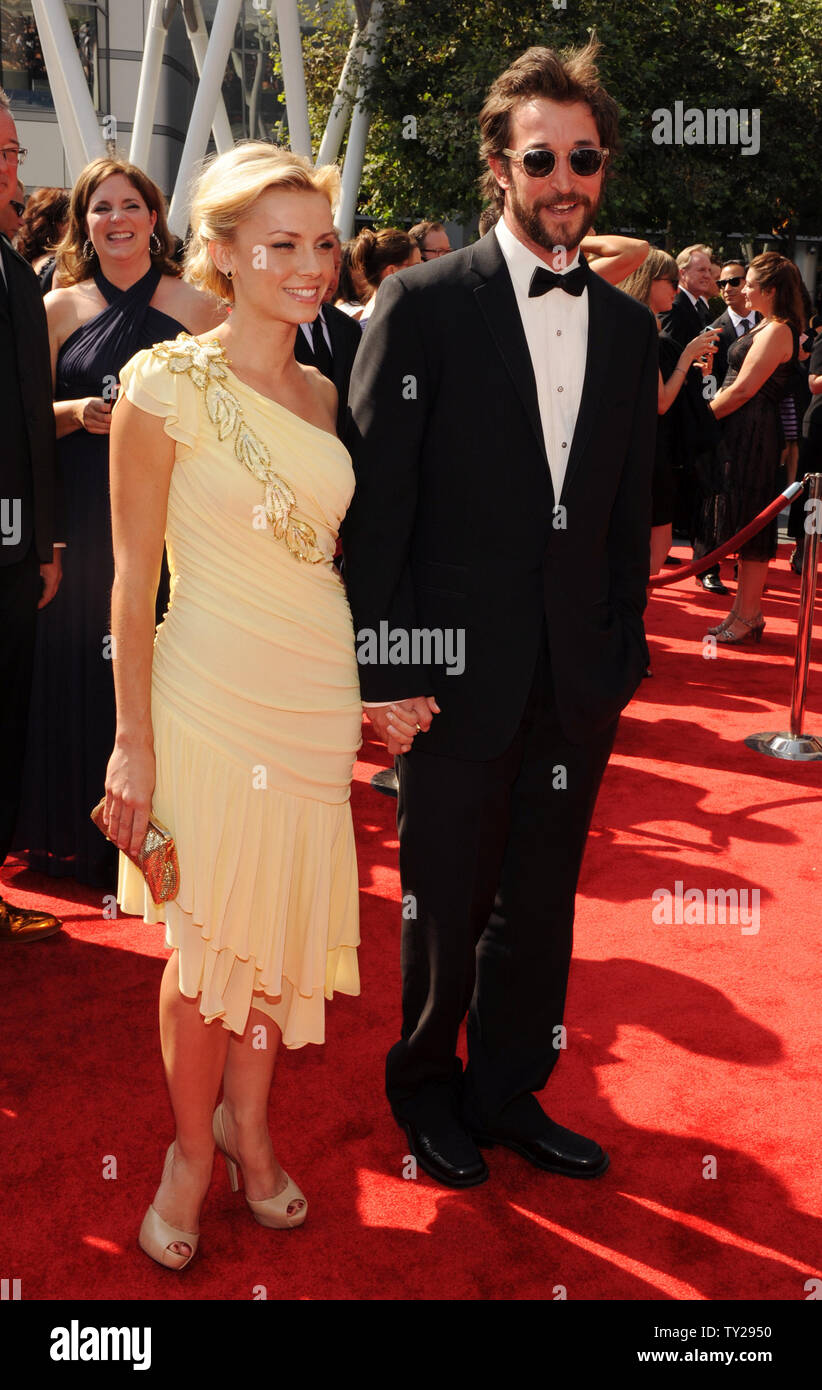 Actor Noah Wylie and his wife, actress Sara Wells arrive for the ...